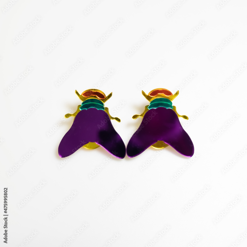 Material methacrylate with a fly shape design on a pastel color ...