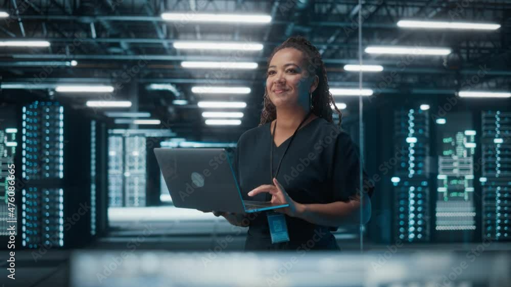 Portrait of Successful African American Female IT Specialist Using ...