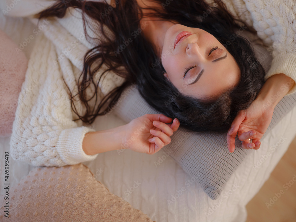 Lovely brunette woman posing in a bedroom. Good morning. Playful ...