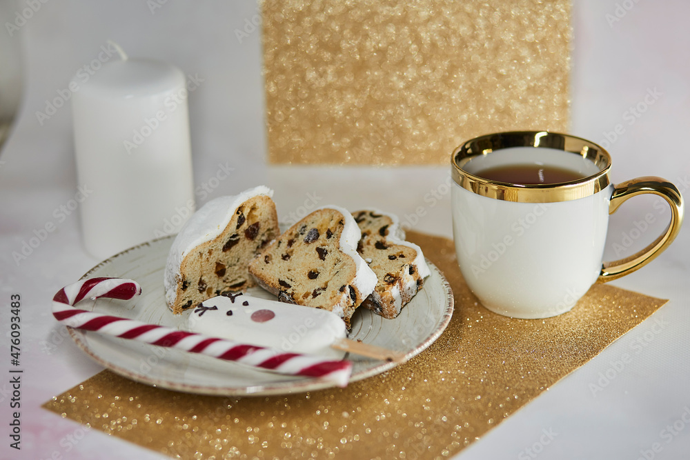 Luxury tea cup, cute marshmallow deer, Christmas stollen and caramel ...