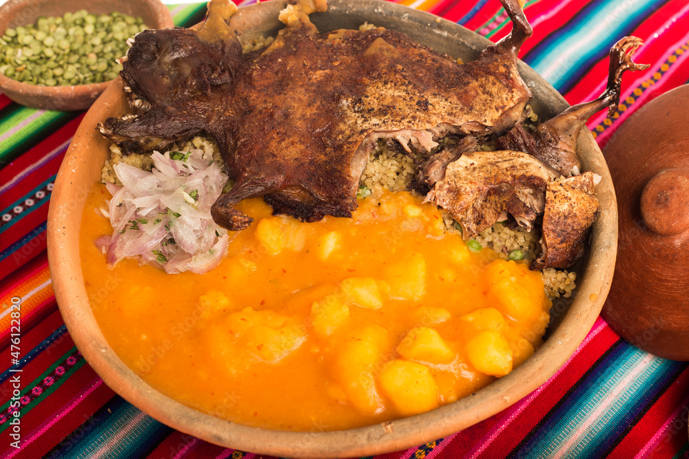 plato de comida peruana, cuy frito con papa picante y arroz de trigo ...