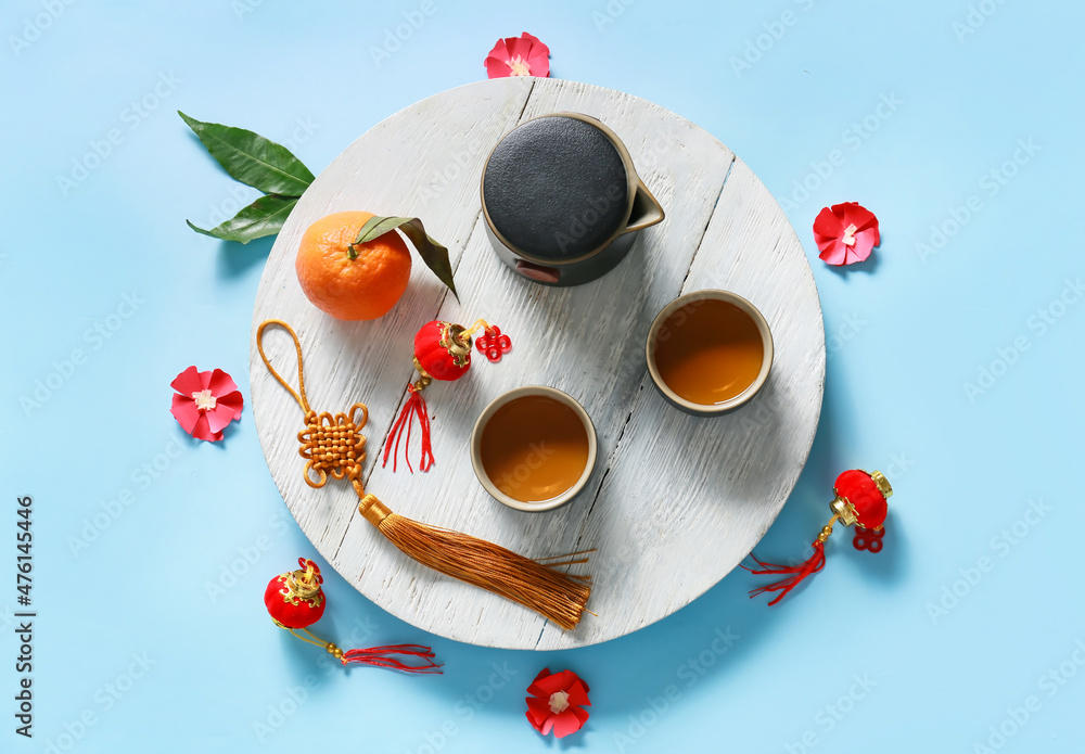 Traditional tea with Chinese symbols on blue background Stock Photo ...