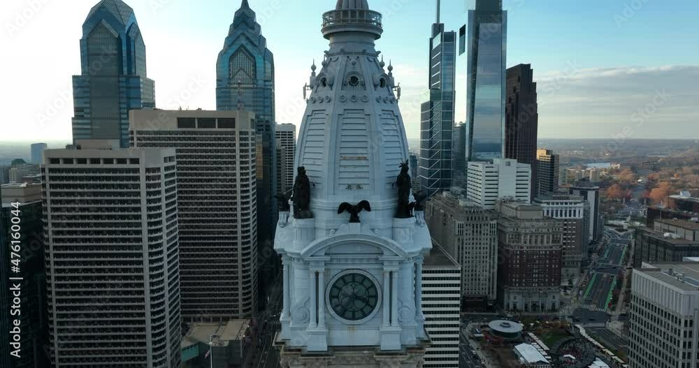 Rising aerial reveals statue atop City Hall. Philadelphia skyline and ...