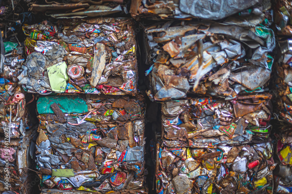 Compacted Metal waste waiting for transport in a recycling center in ...