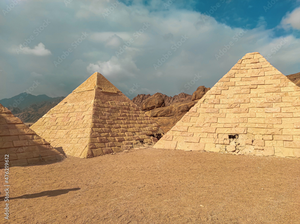 Pyramids in Egypt, ancient buildings and monuments. Statues in mini ...
