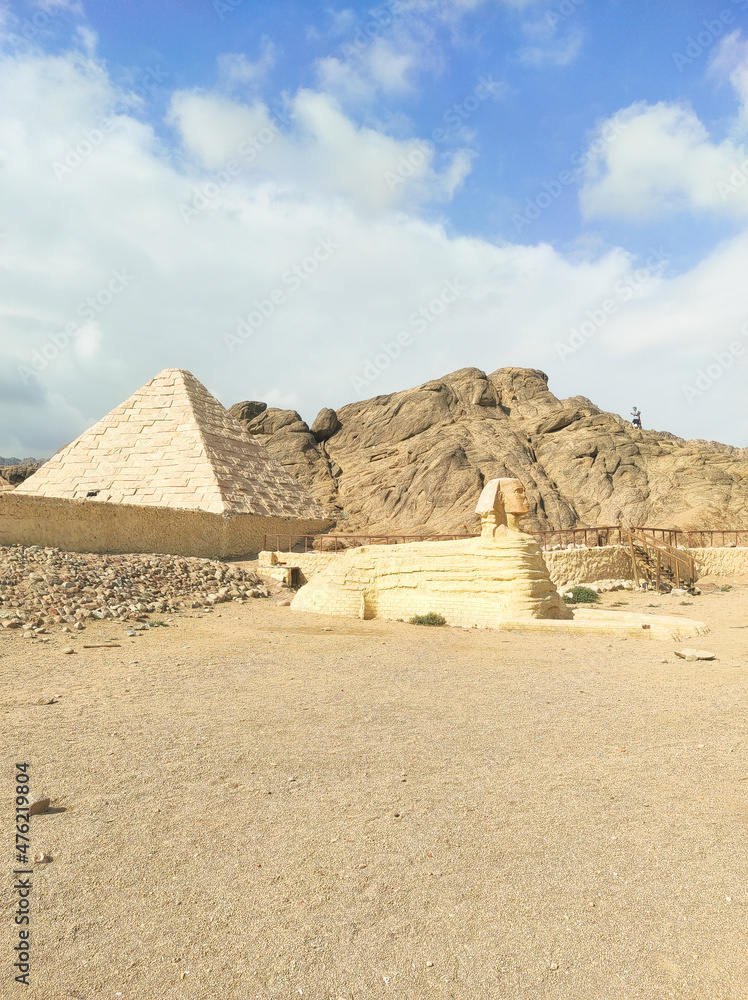 Pyramids in Egypt, ancient buildings and monuments. Statues in mini ...