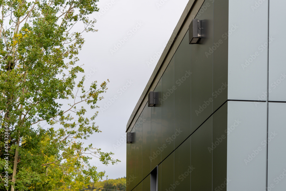 The exterior wall of a contemporary commercial style building with ...