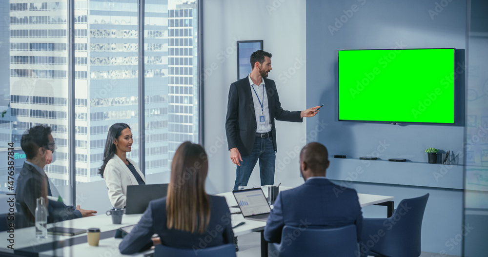 Office Conference Room Meeting Presentation: Handsome Businessman Talks ...