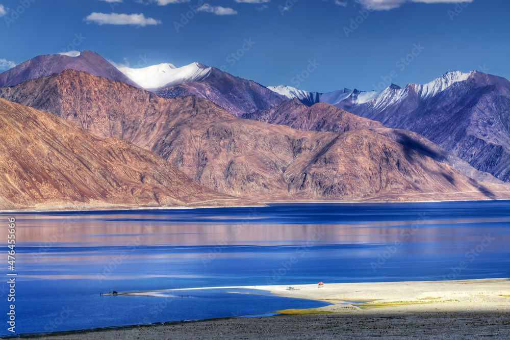 Mountain reflection on Pangong tso (Lake). It is huge lake in Ladakh ...
