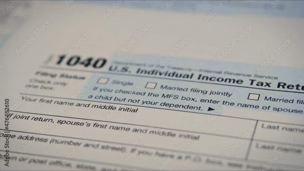 1040 Tax Form paper blanks lies on table. Filling individual income tax ...