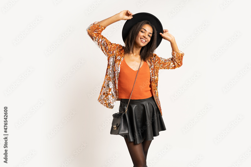Stylish mix race woman dancingo on white background. Glad black girl ...
