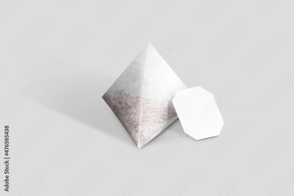 Blank tea bags with label tag and dried leaves inside. Tea box ...