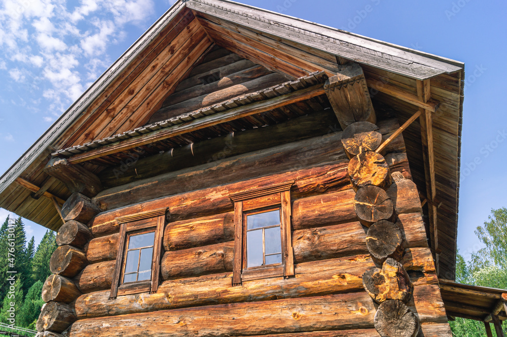 Wooden rural house made of huge logs. This house was built in the ...