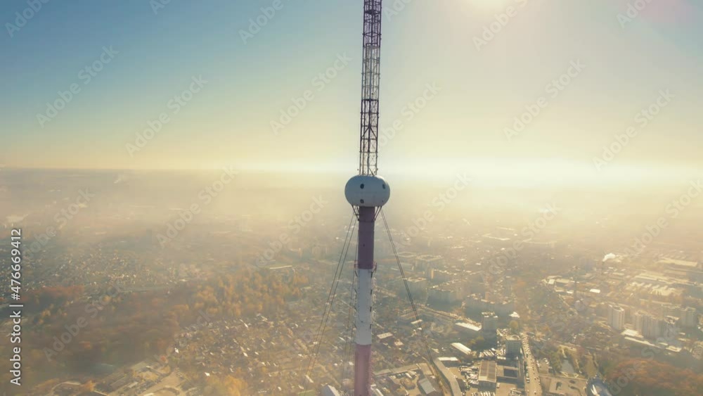 Closeup aerial view around of the telecommunication tower. Telecom tower antennas and satellite ...