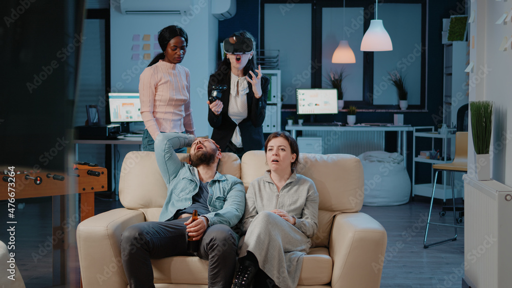 Foto de Woman playing video games with joystick and vr glasses, losing ...