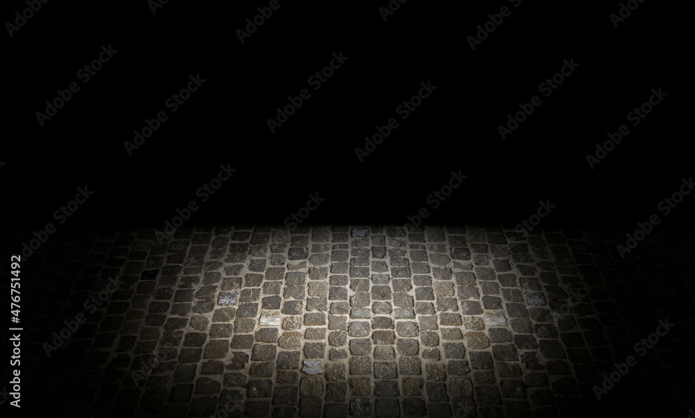 Shot of a cobblestone structure on the ground of an urban street in ...
