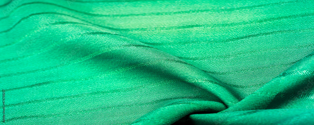 simple green fabric with lines. The lines formed by the extraction of ...