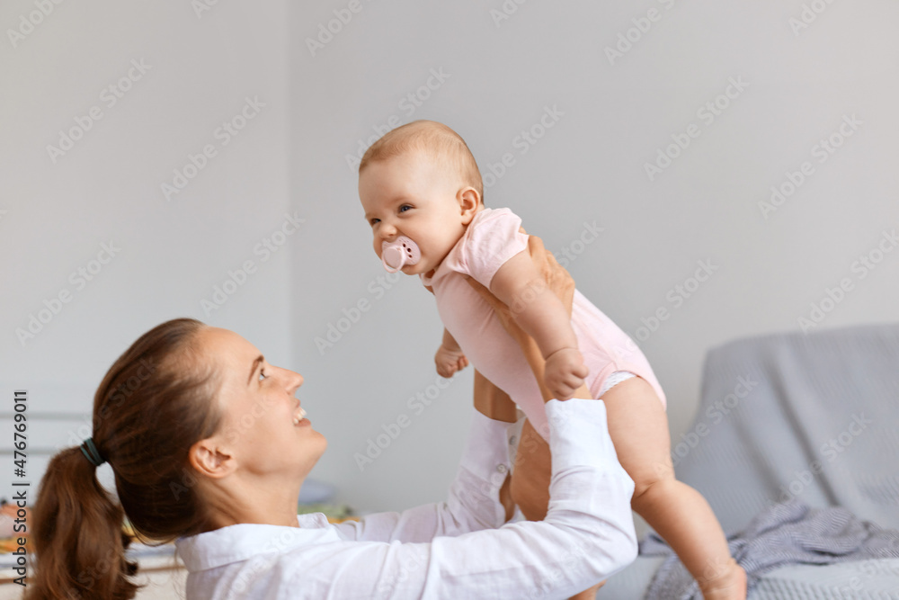 Happy positive smiling young adult female spending time with her ...