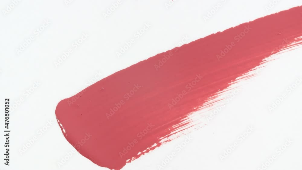 Cosmetic liquid lip gloss, lipstick smudge, smear, stroke. Brush ...