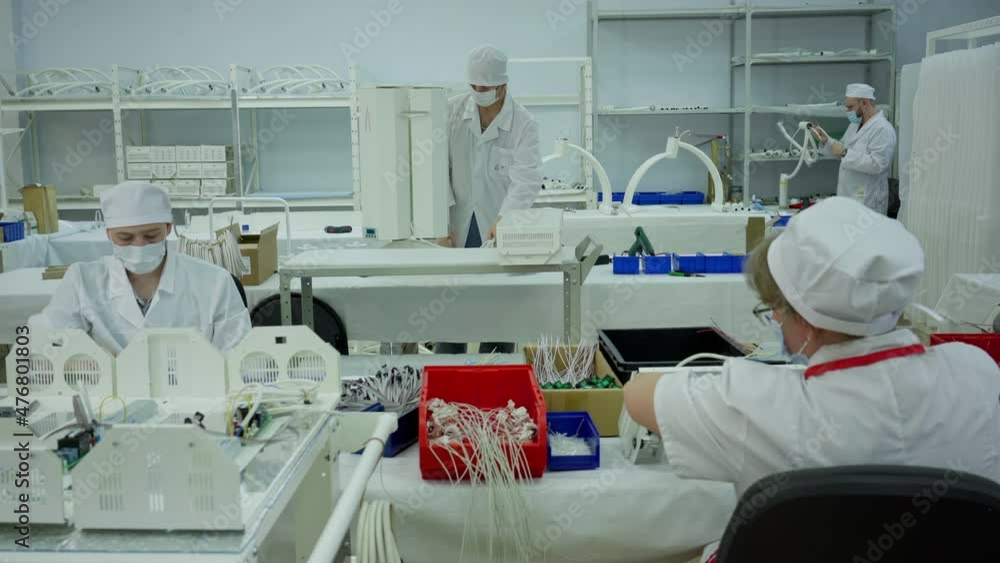 Medical Equipment Production. Many Mechanics are Operating in the ...