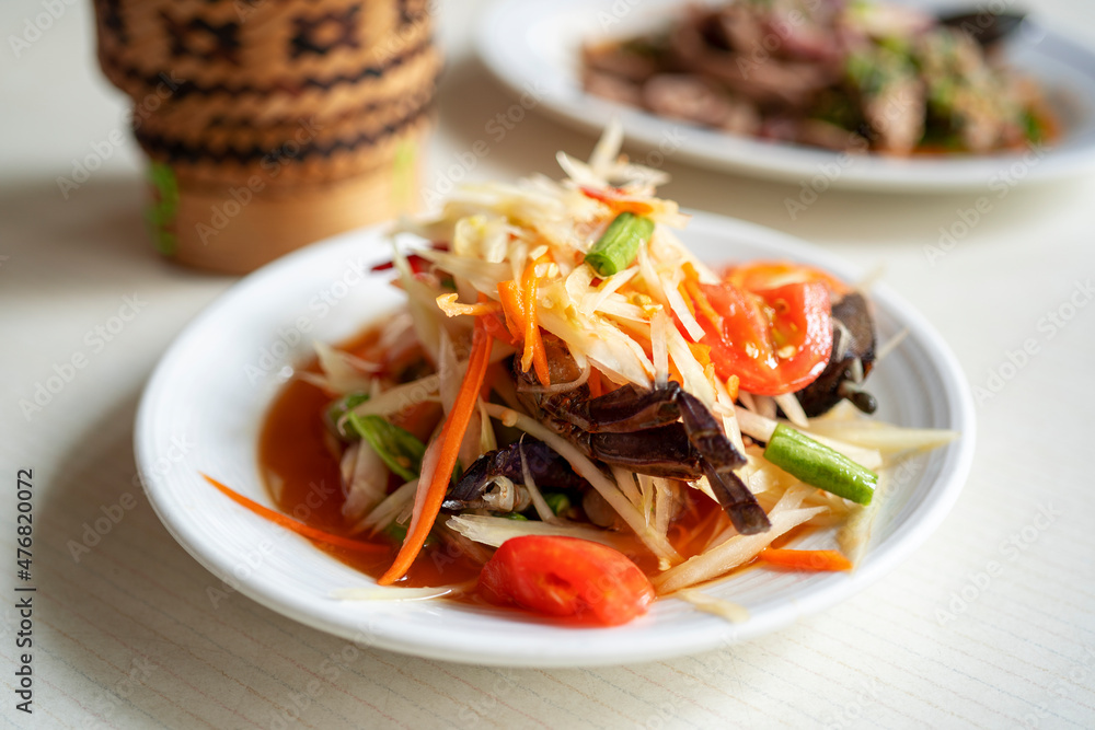Homemade Spicy Papaya Salad with Salty Crab, called Som Tam Poo in Thai ...