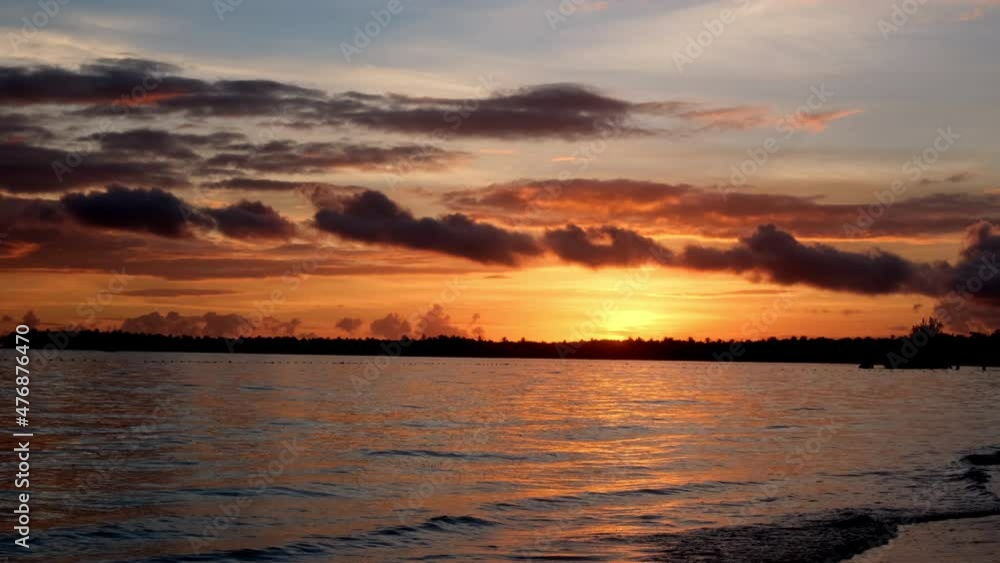 The sun over sea. Amazing red sunrise on beach palms island. Orange ...
