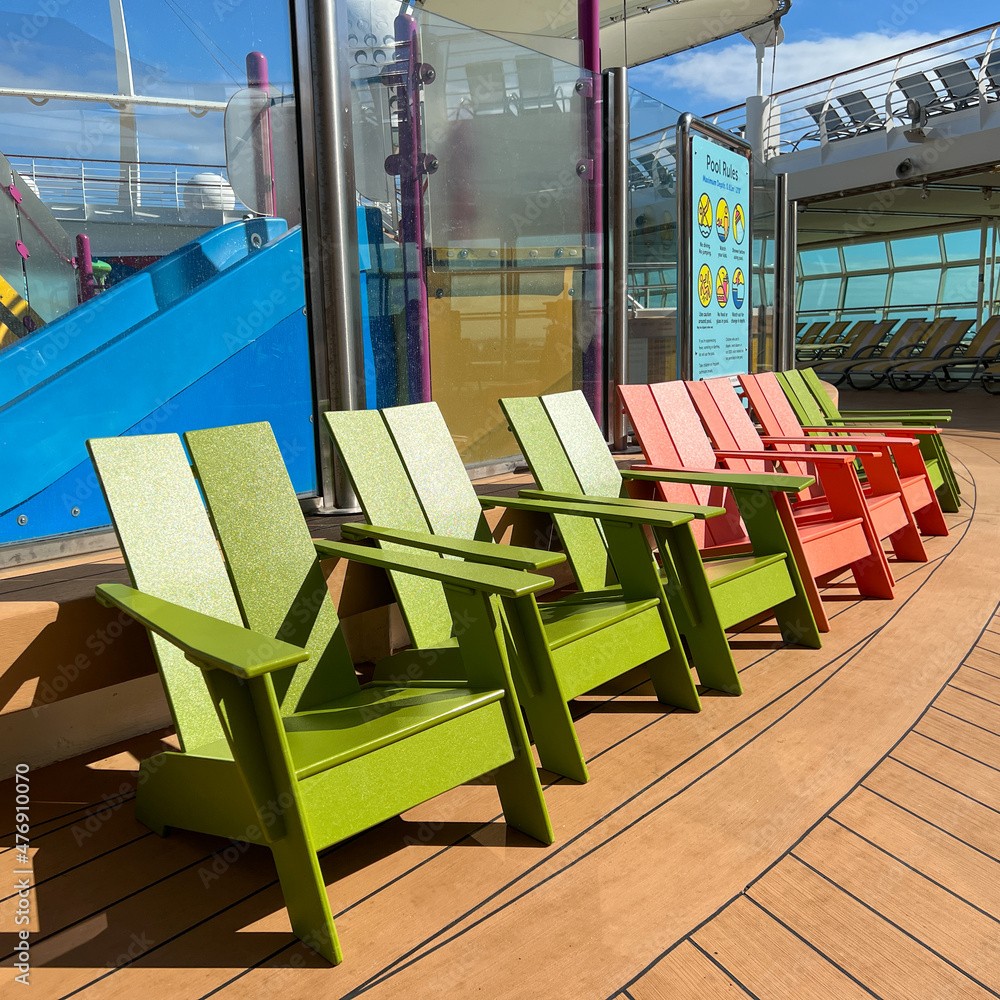 Colorful chairs in the family pool area on the Royal Caribbean RCL ...