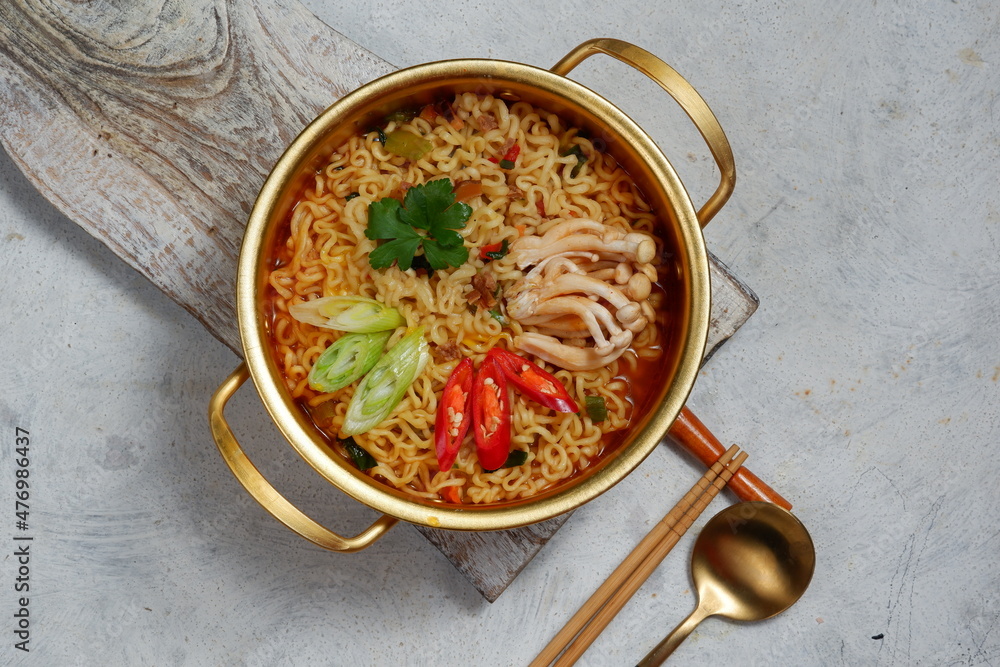 Serving a Korean style instant noodle, Ramyeon or Ramyun with spicy ...