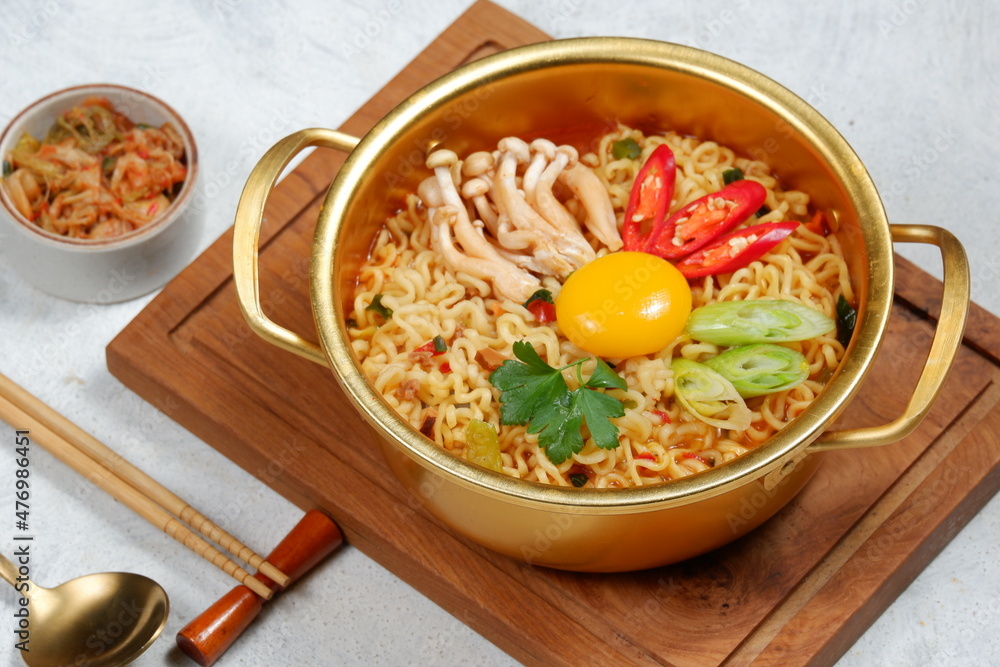 Serving a Korean style instant noodle, Ramyeon or Ramyun with spicy ...