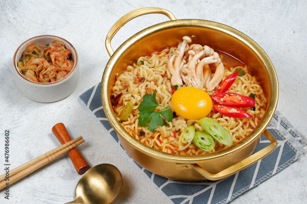 Serving a Korean style instant noodle, Ramyeon or Ramyun with spicy ...