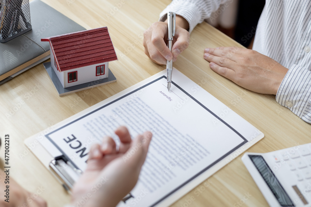 Contract signing, Home broker or salesperson allows customers to sign a ...