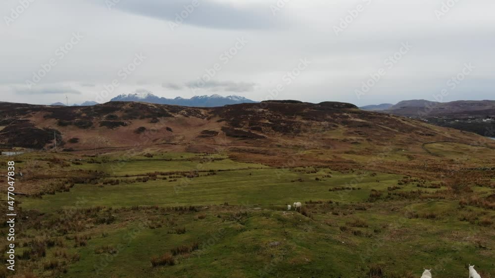 Aerial footage showing the vast landscape that is the Isle of Skye as ...