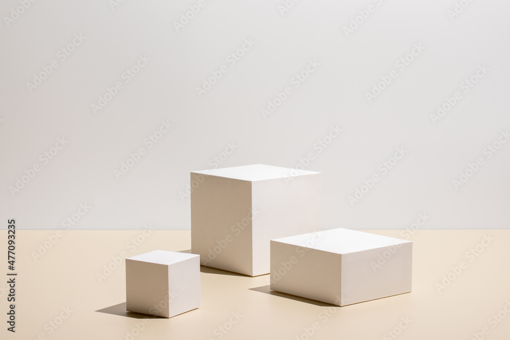 Abstract minimal scene - empty stage with three white rectangle podiums ...