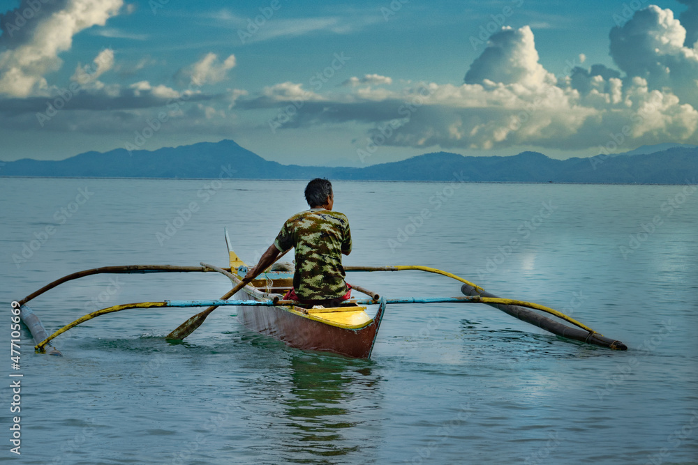 Lone net fisherman. Traditional fishing for small fish. Oriental ...