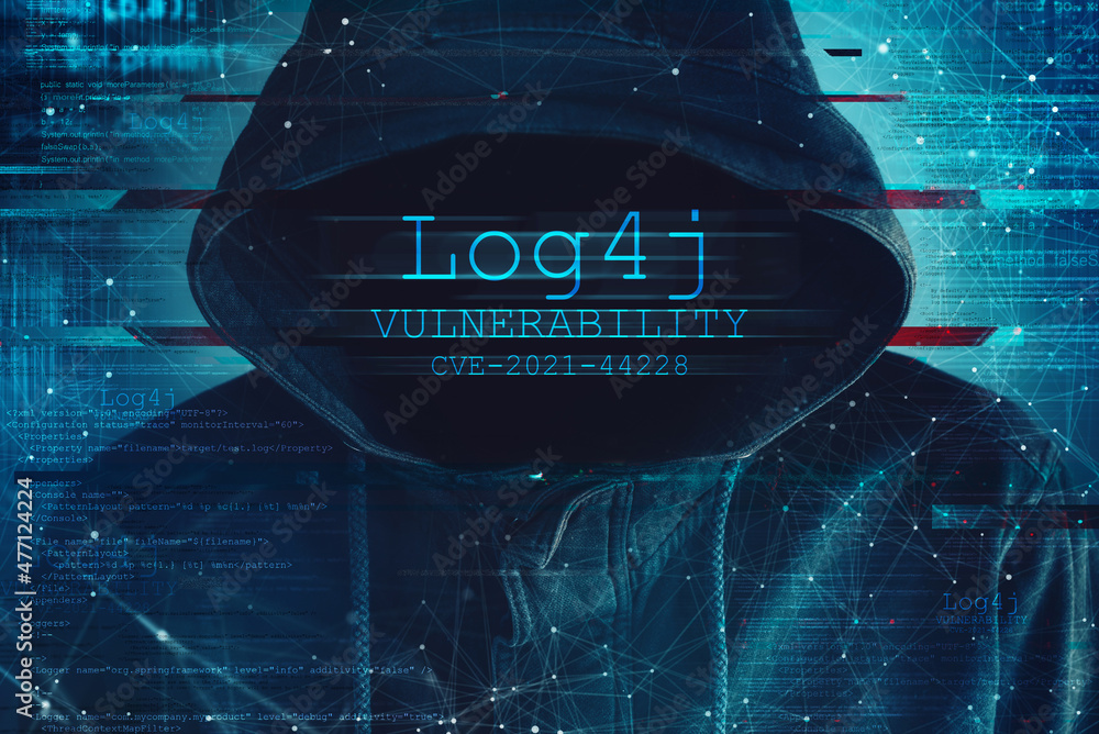 Hooded computer hacker in cybersecurity vulnerability Log4J concept ...