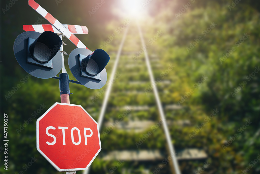 Stop sign background. Long railway landscape. Road sign suggesting ...