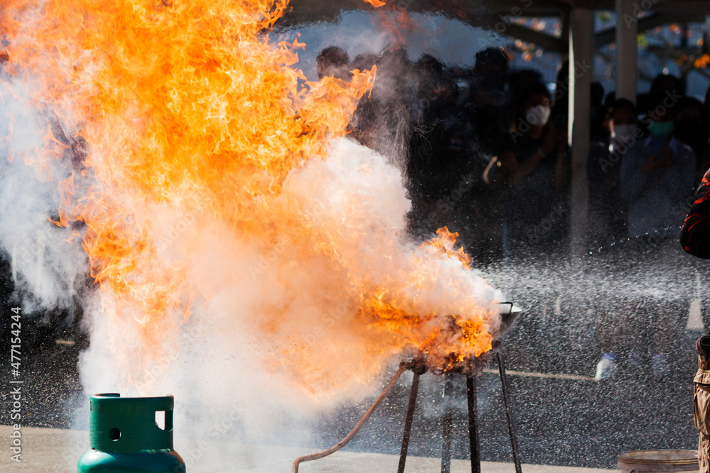 Demonstrate or simulate a burning flame. This is caused by the oil in ...