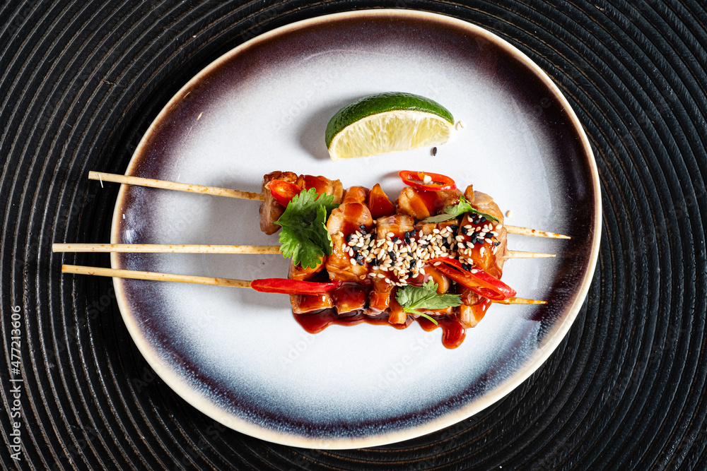 Poster Malaysian chicken satay with delicious peanut sauce, one of ...