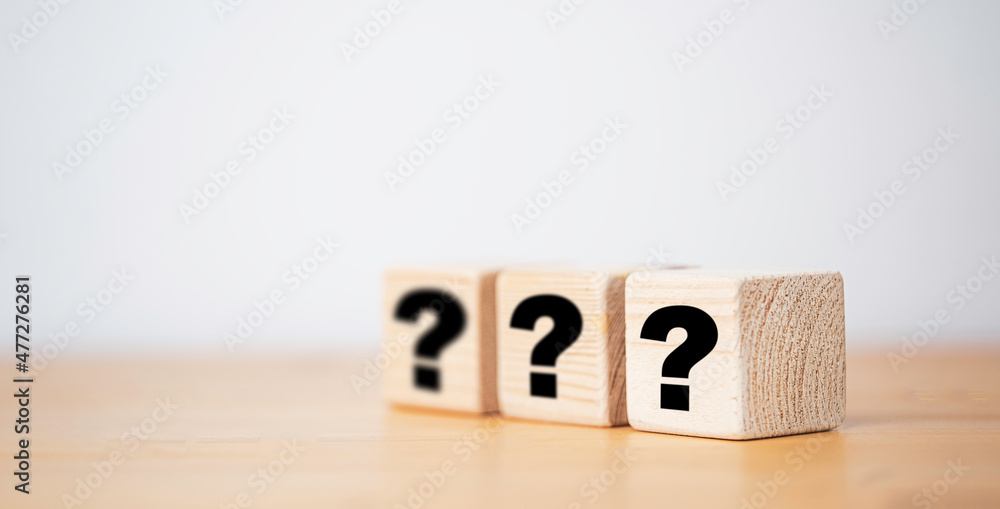 Question mark print screen on wooden cube block with copy space for ...