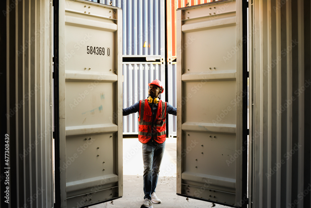 African black man worker wearing safety work equipment clothes are ...