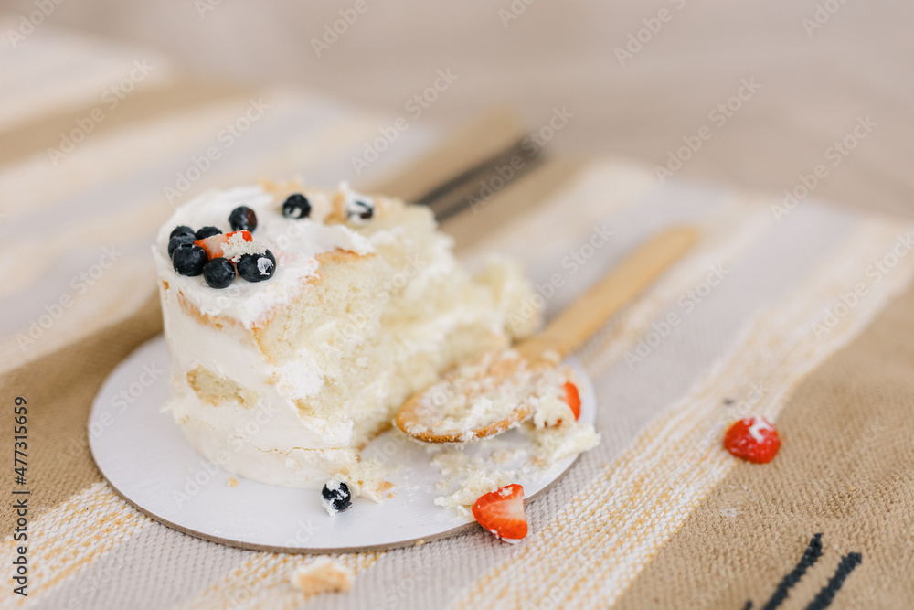 broken white cake. crash cake. at the celebration of the girl's first ...