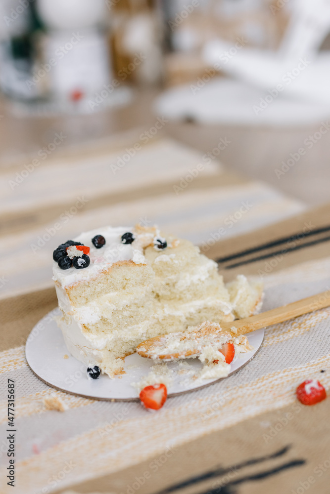 broken white cake. crash cake. at the celebration of the girl's first ...