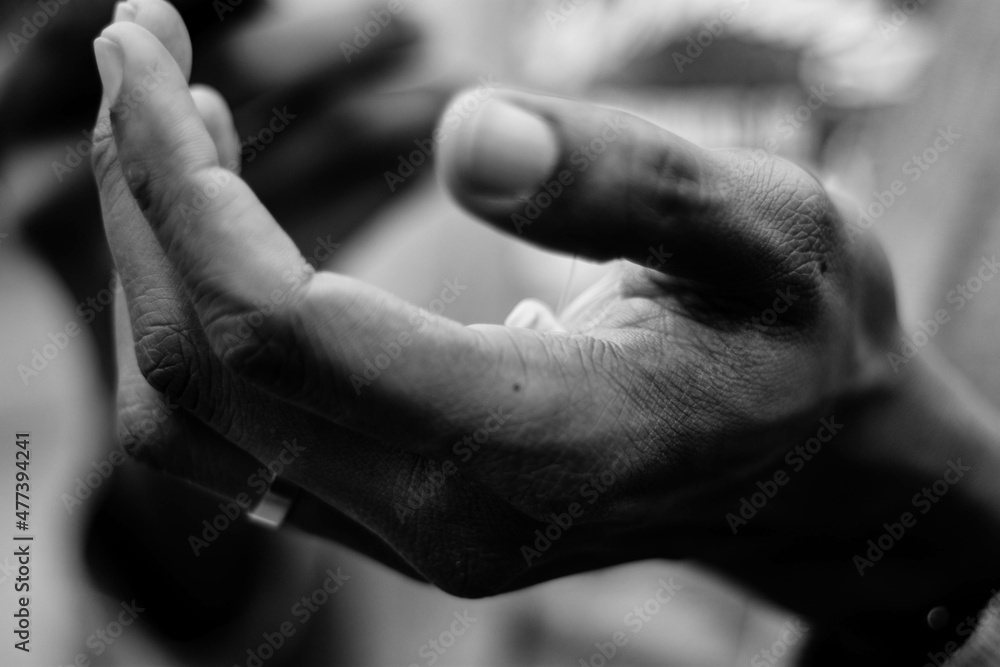 Grayscale photo of an open hand begging Stock Photo | Adobe Stock