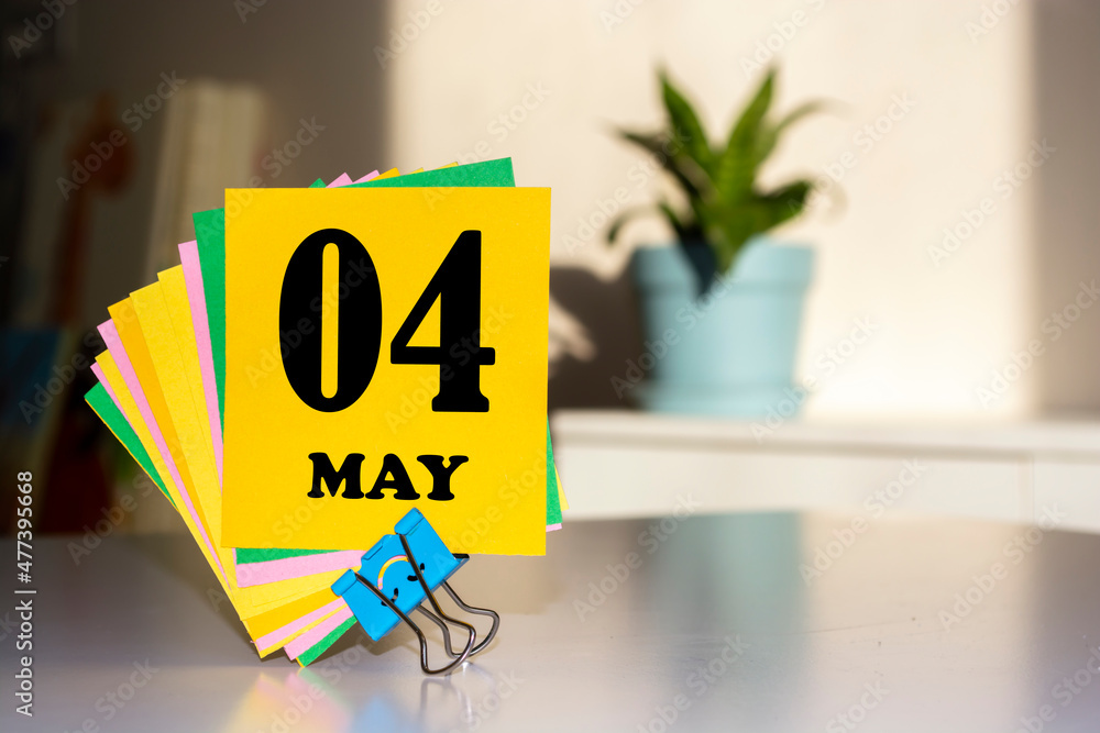 May 04 written on a calendar to remind you an important appointment ...