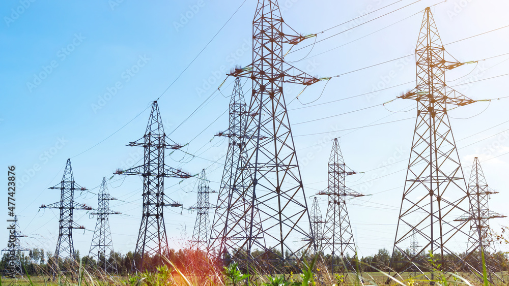 Transmission pylons with high-voltage power lines with copy space ...