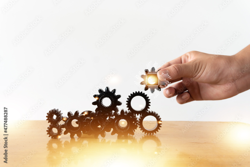Cogs and gear wheel mechanisms. Hi-tech digital technology and ...