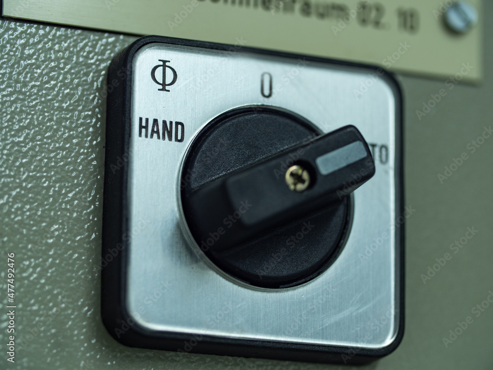 Main switch in black and metal turned to the right. Electricity switch ...