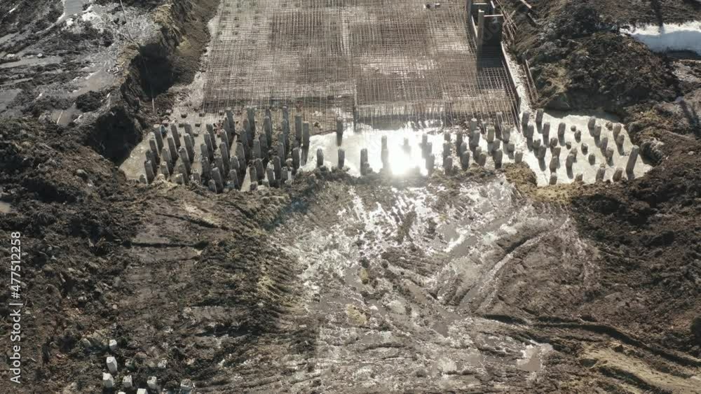 Concrete reinforcement concept. Pit and piles of a future multi-storey ...