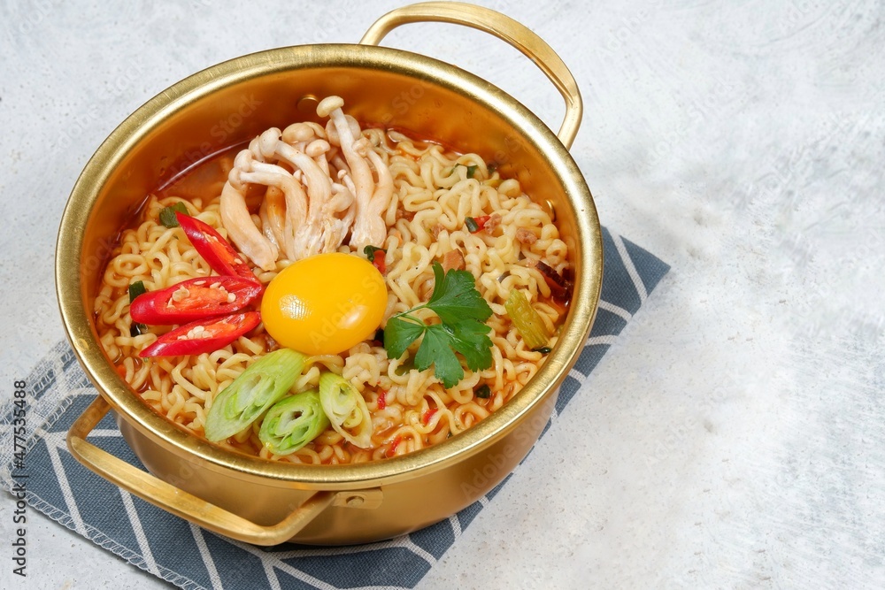 Serving a Korean style instant noodle, Ramyeon or Ramyun with spicy ...