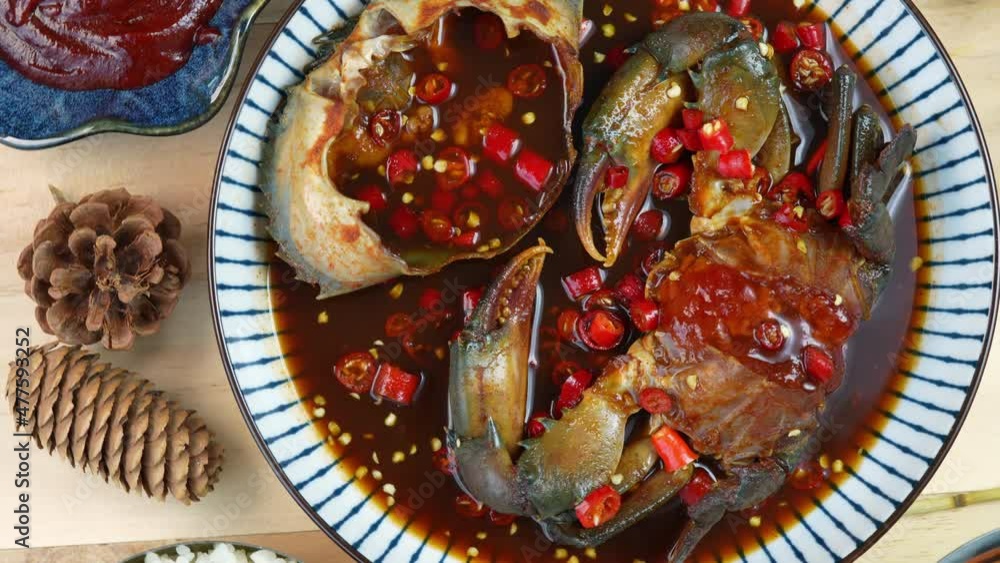 Korean spicy Fresh raw crabs marinated in a mild soy sauce, Ganjang ...